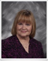 Three’s Company: Award-winning Teacher Not the Only Night Owl at Her School