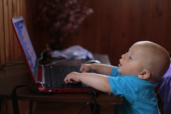 kid using computer